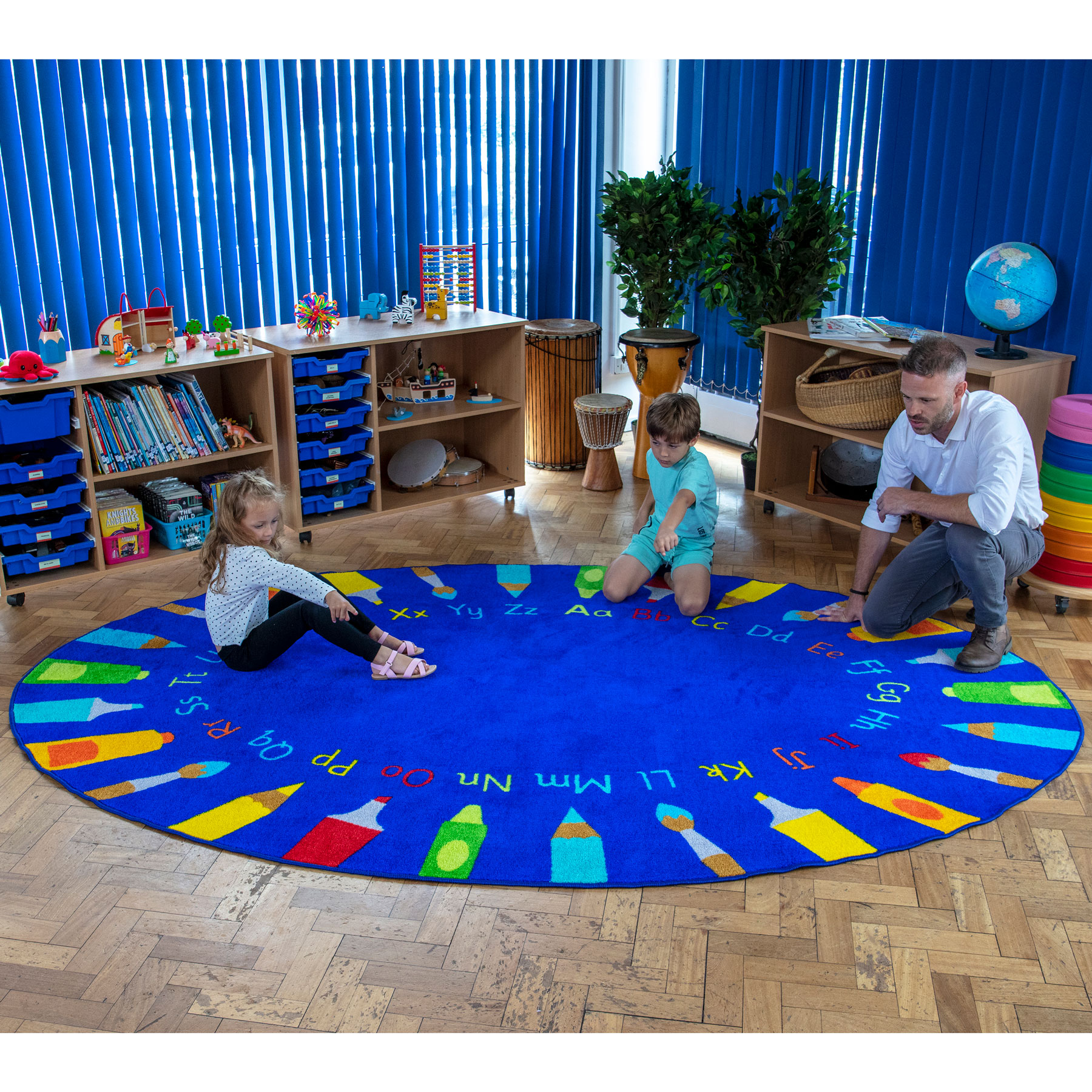 Rainbow™ Oval Pencils Alphabet Carpet | theClassroom.co