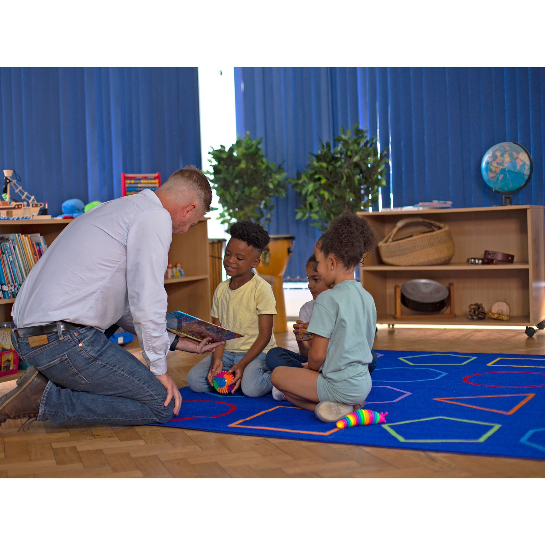 Essentials Rainbow Geometric Carpet | theClassroom.co