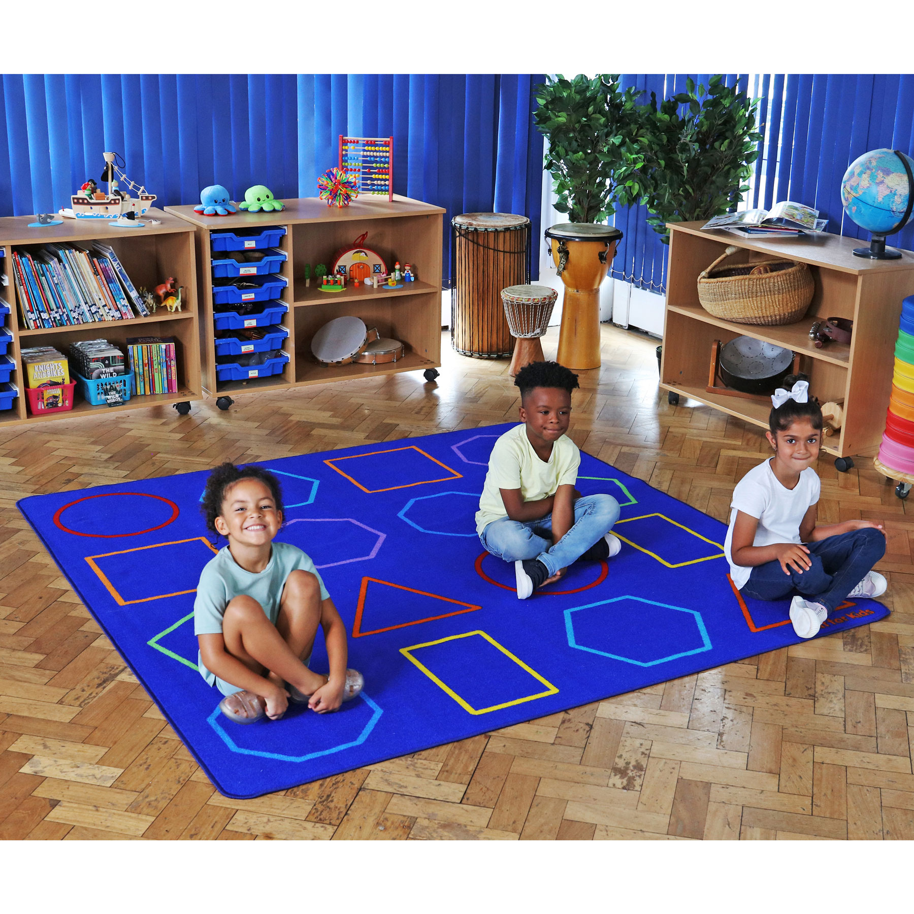 Essentials Rainbow Geometric Carpet | theClassroom.co